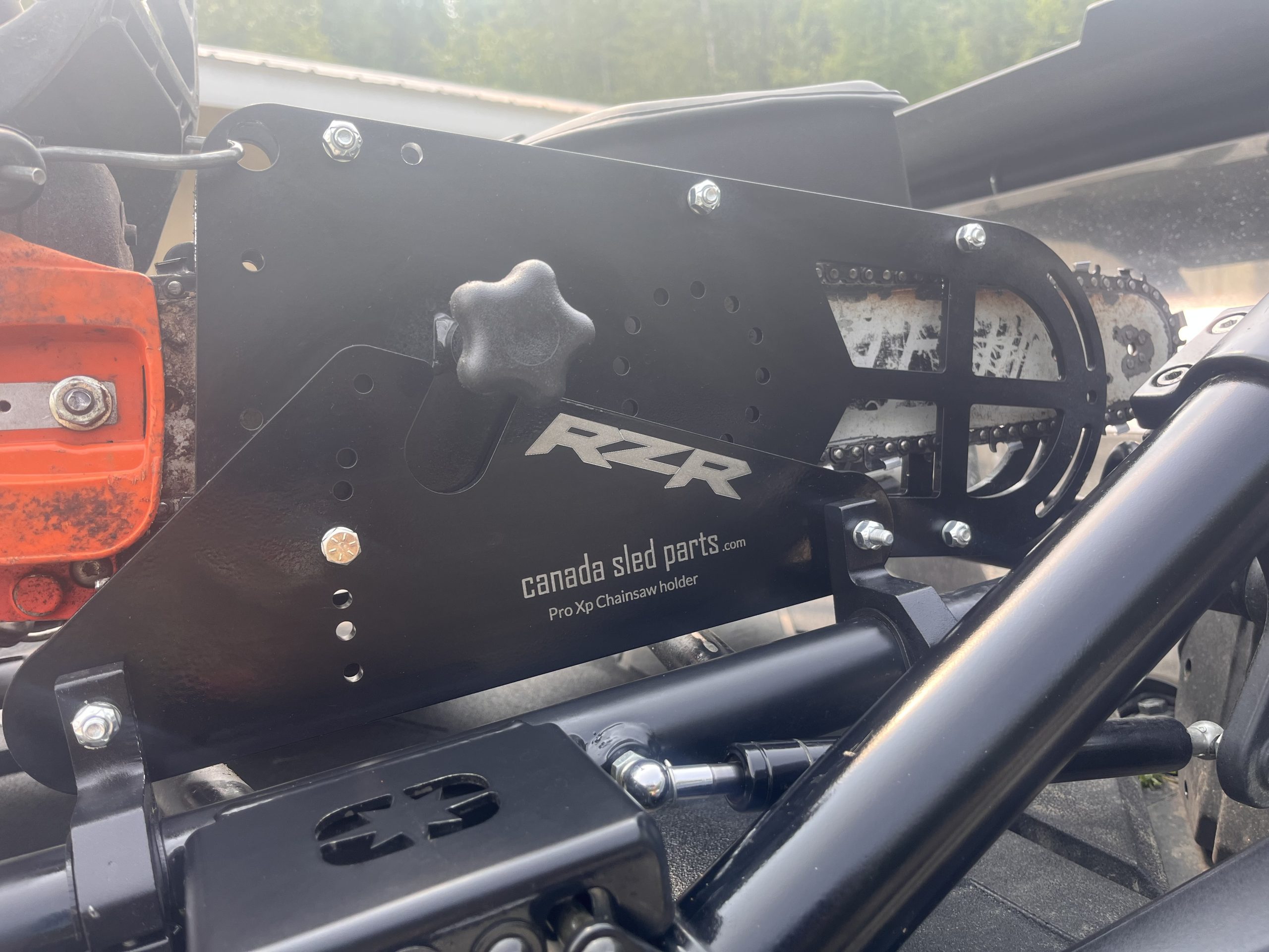 RZR Pro Xp Chain saw holder for Polaris tire rack – Canada Sled Parts